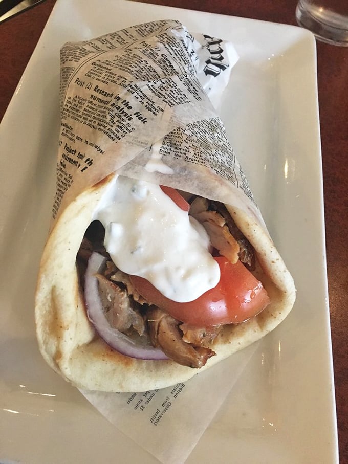 Not all heroes wear capes—some come wrapped in warm pita with tzatziki cascading down the sides like a creamy waterfall.