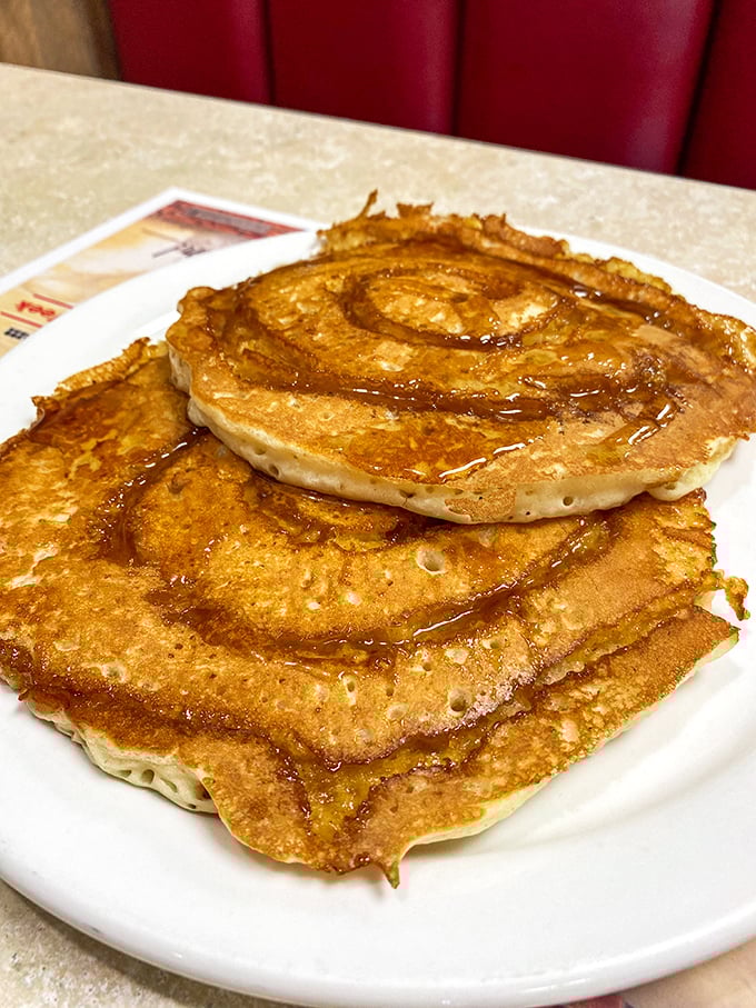 Cinnamon swirl pancakes that make you question every other pancake you've ever eaten. The caramelized spiral creates textural magic that would make even diet-conscious folks throw caution to the wind.