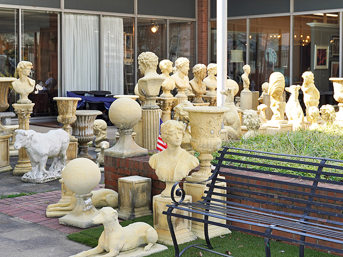 The garden statuary section—where you can find the perfect stone companion for your roses or that Greek goddess to silently judge your neglected lawn care.