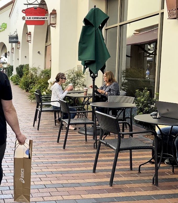Taking a coffee break between shopping conquests—the unofficial strategy meeting of serious bargain hunters everywhere.