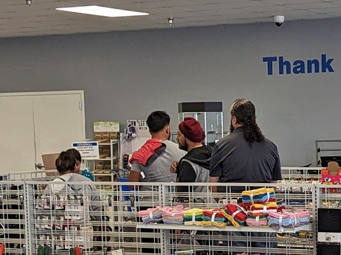 The checkout line: where strangers bond over their archaeological discoveries and silently judge each other's taste in vintage lamps.