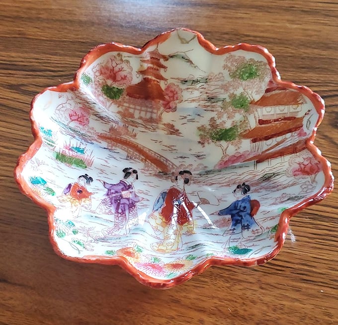 This delicate hand-painted bowl isn't just dishware—it's functional art with a history, ready for its second chapter in your china cabinet.