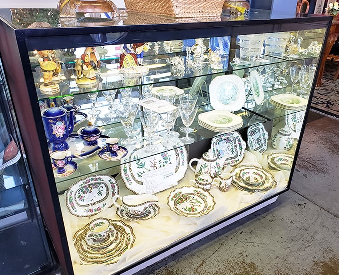 Behind glass, generations of fine china tell tales of special occasions and Sunday dinners—each pattern a family's history preserved in porcelain.