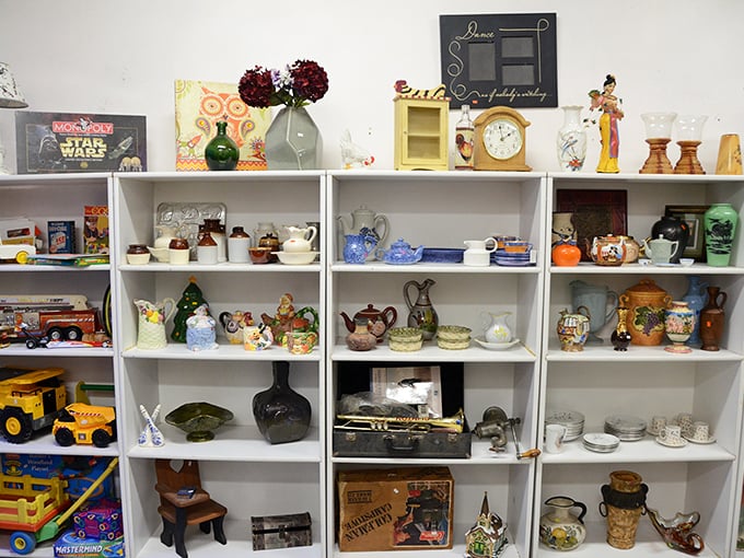 Curio shelves that would make your grandmother swoon—teapots, figurines, and knickknacks arranged like a museum of everyday Americana.
