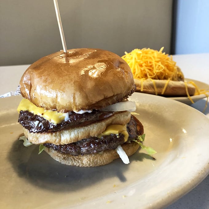 Behold the burger that launched a thousand food pilgrimages—juicy, perfectly charred, and demanding to be photographed before it disappears.