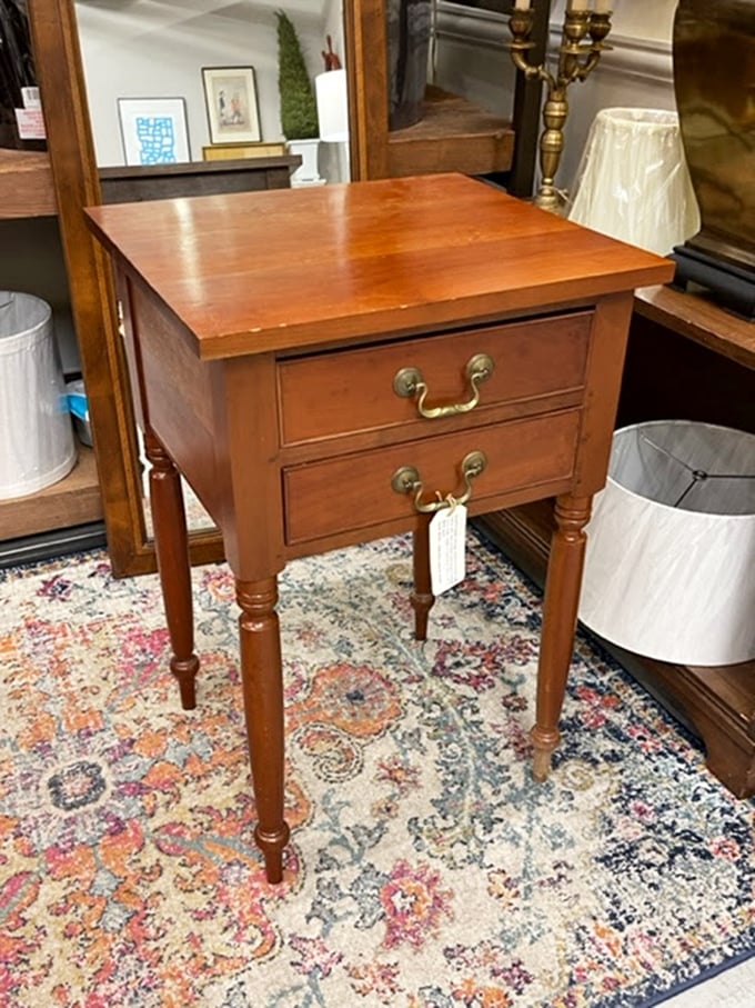 Not just a table, but a time capsule with drawers. Those brass pulls have felt the touch of countless hands across generations.