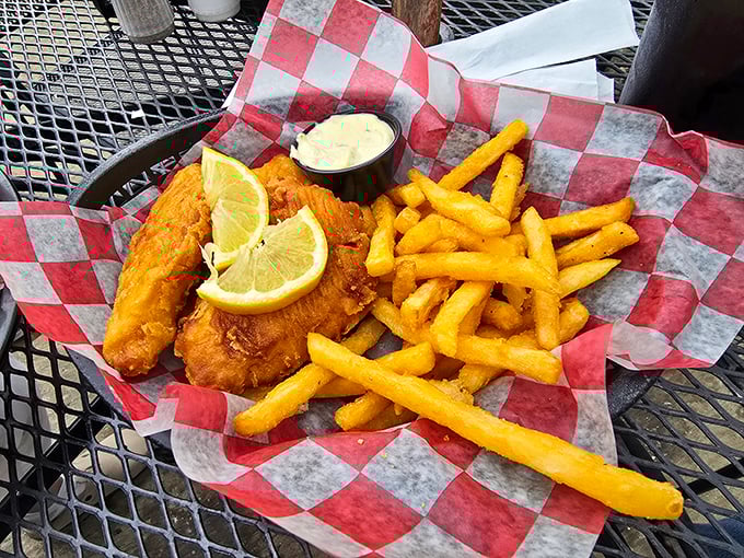 Golden perfection meets tartar sauce in a combination that would make any coastal grandmother beam with pure culinary pride.