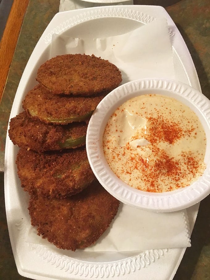 Fried green tomatoes done right—crispy, tangy, and served with a creamy sauce that adds just the right amount of richness to this Southern classic.