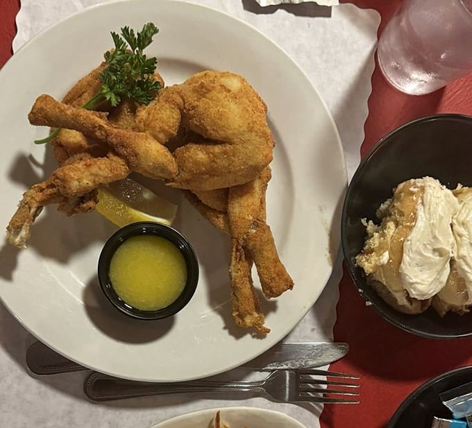 Frog legs: Where Southern cooking meets Wisconsin supper club tradition. Crispy, golden, and served with drawn butter—they're the conversation starter that becomes the conversation.