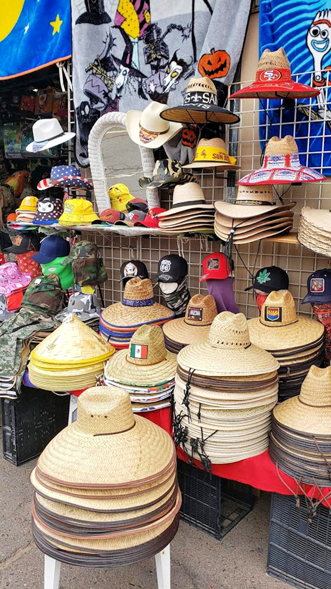 Hat diplomacy in action—Mexican sombreros neighbor with Arizona sun hats and baseball caps in this multicultural headwear headquarters.