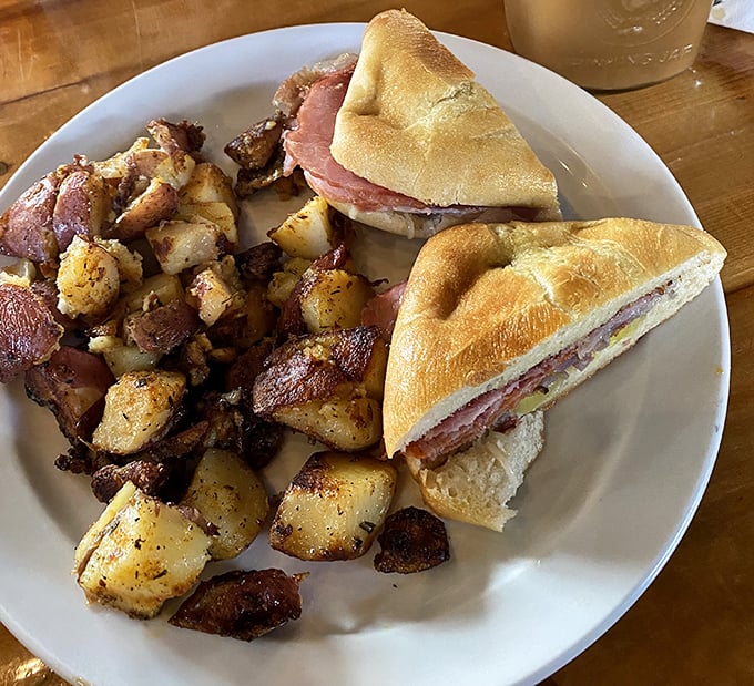The sandwich might be the star, but those home fries deserve their own fan club—crispy outside, fluffy inside, and perfectly seasoned throughout.