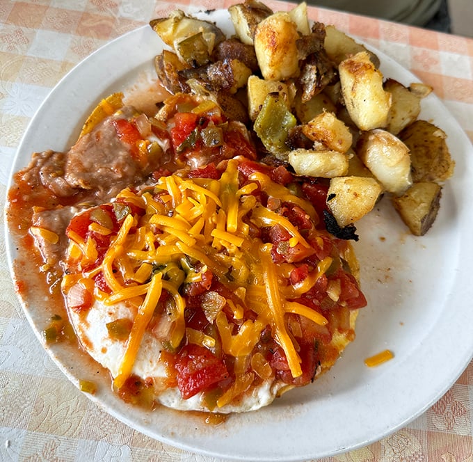 Southwest breakfast artistry at its finest—crispy potatoes, melted cheese, and a fiesta of flavors that would make your abuela proud.