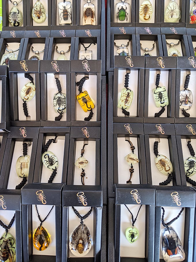 Nature's creatures suspended in time—these resin pendants transform scorpions and beetles into conversation-starting jewelry. Entomology meets fashion.