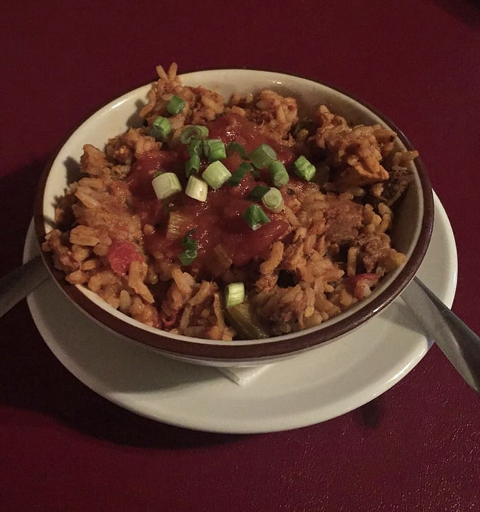 This isn't just rice – it's a spicy jambalaya canvas painted with flavors that would make New Orleans natives nod in respectful approval.