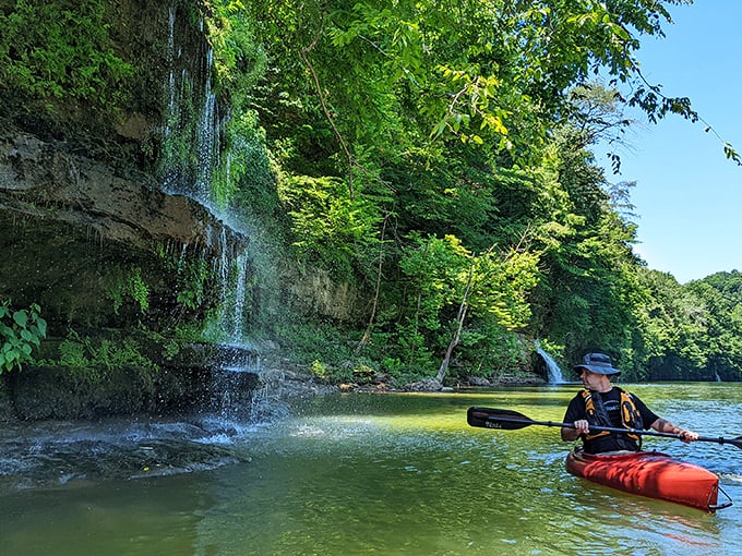 Kayaking beneath gentle cascades – where "getting your feet wet" takes on an entirely new, more adventurous meaning.