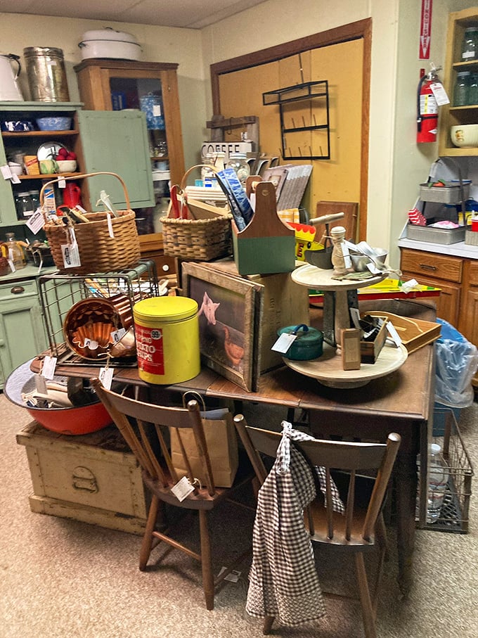 This kitchen vignette feels like stepping into a 1950s farmhouse – complete with vintage canisters that probably held cookies your grandma wouldn't let you have before dinner.