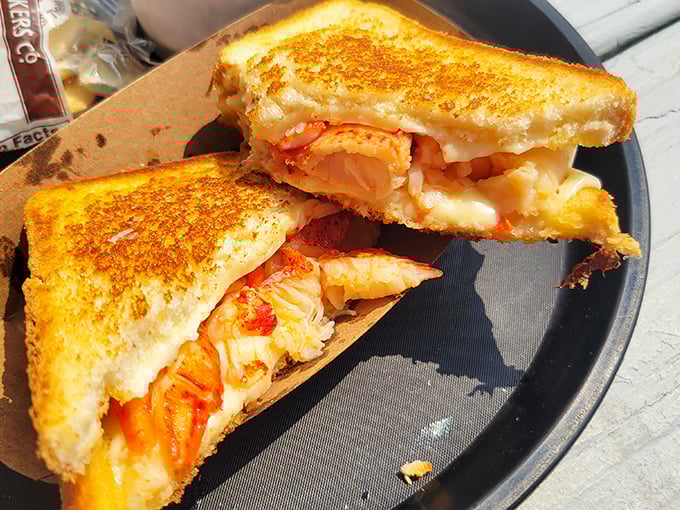 The lobster grilled cheese that haunts your dreams – where childhood comfort food meets grown-up indulgence in a golden, crispy package.