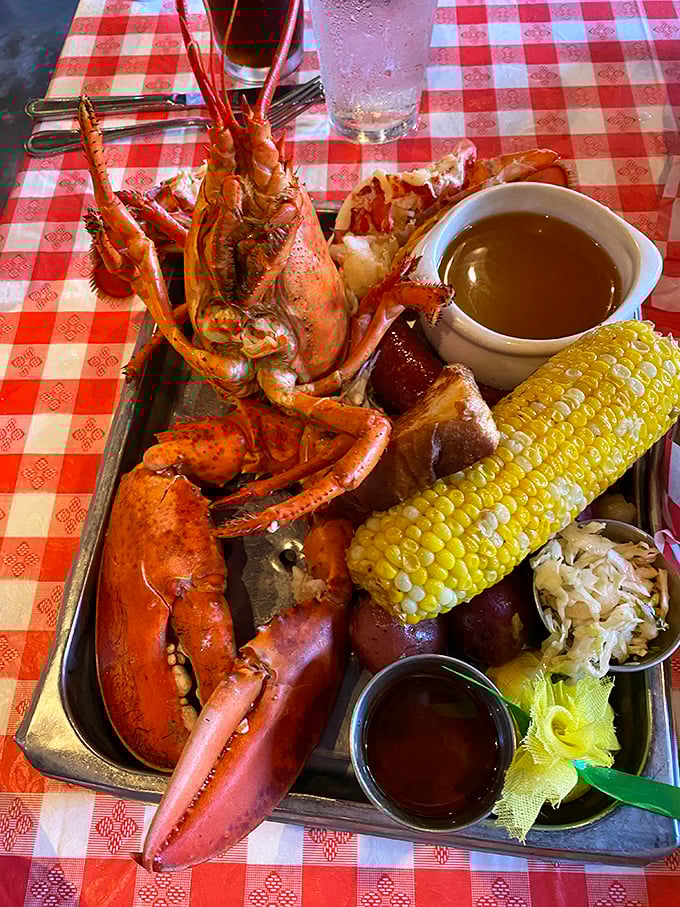 This isn't just a lobster, it's a crustacean celebration—complete with corn, potatoes, and enough drawn butter to make your cardiologist wince approvingly.