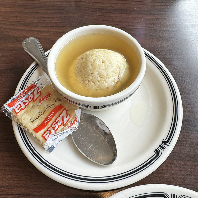 Matzo ball soup that would make your grandmother nod in approval—the chicken penicillin of Jewish delis everywhere.
