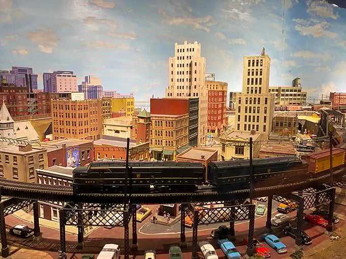 This miniature cityscape brings urban America to life, complete with tiny trains navigating the hustle and bustle above.