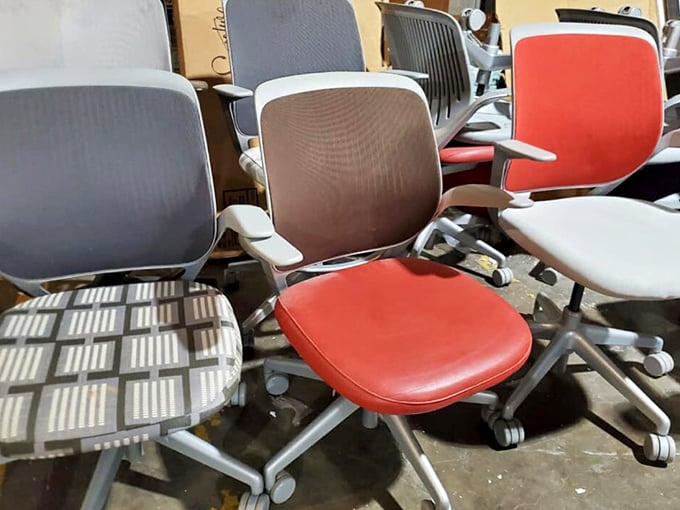 The office chair lineup looks like they're auditioning for a workplace sitcom. That red one definitely has main character energy.
