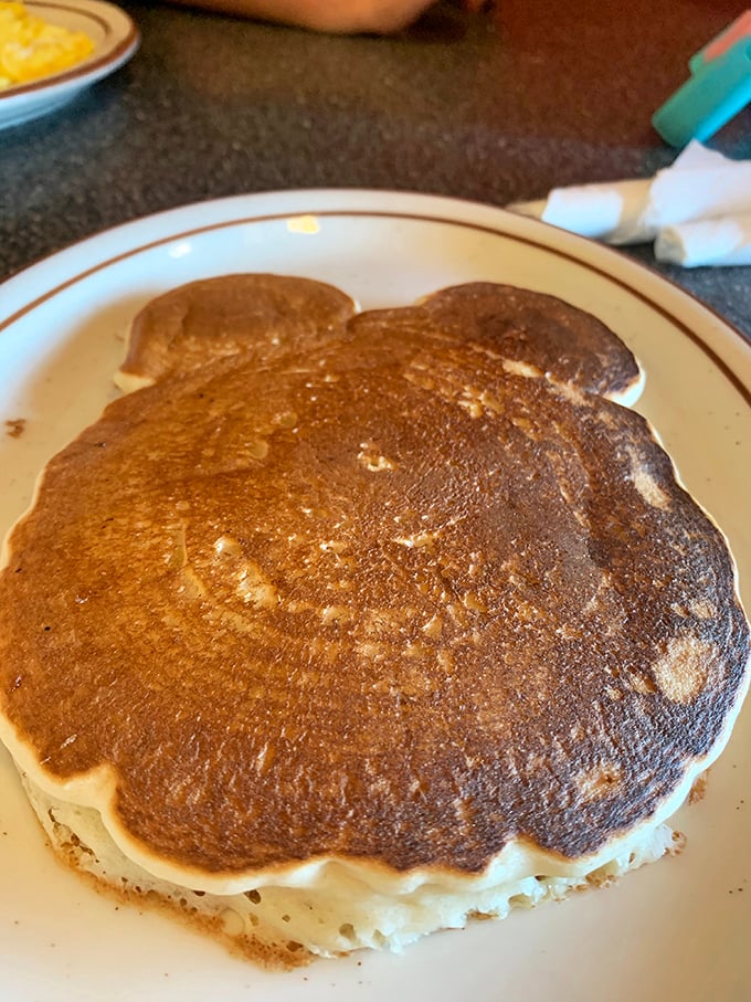 The pancake that ate Fresno! This magnificent carb canvas doesn't just hang over the edge of the plate – it establishes dominance over it.