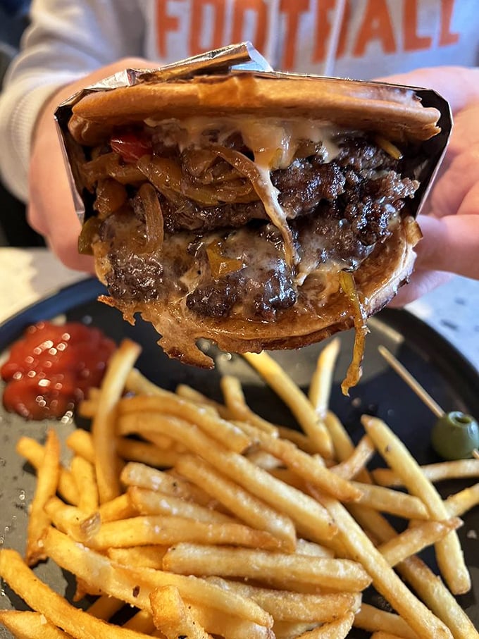 The patty melt here doesn't just satisfy hunger—it obliterates it with caramelized onions cascading over melted cheese and beef like a savory waterfall.