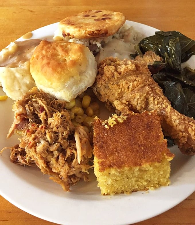 The holy trinity of Southern eating: a cloud-like biscuit, perfectly fried chicken, and collard greens cooked with enough soul to make your grandma jealous.