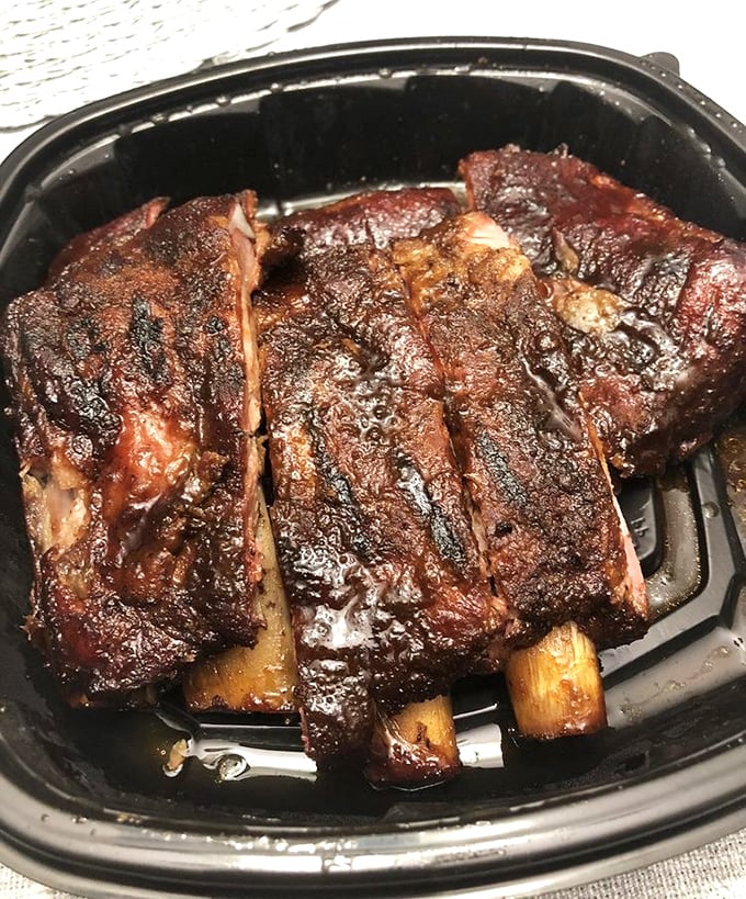 These ribs don't just fall off the bone – they maintain that perfect competition texture that makes you work just enough to feel accomplished.