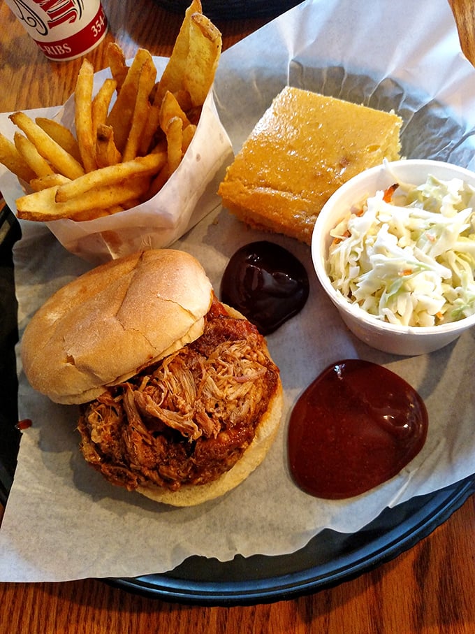 A pulled pork sandwich that doesn't need fancy frills—just tender, smoky meat, tangy sauce, and a soft bun to bring it all home.