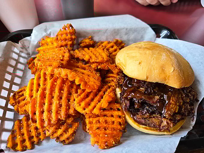 The pulled pork sandwich with waffle fries – a partnership more perfect than Astaire and Rogers, with better seasoning. 