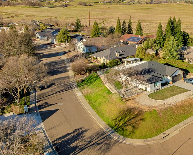 Neighborhoods where driveways aren't measured in inches and solar panels soak up sunshine that's free for everyone – suburban living without the suburban price tag.