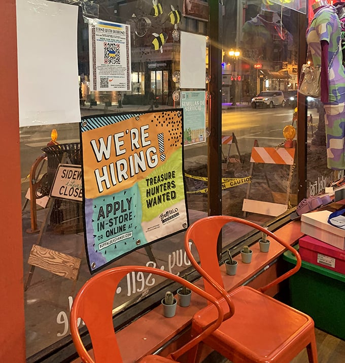 Even the waiting area screams personality with those punchy orange chairs—because at Buffalo Exchange, the treasure hunt experience deserves stylish seating.