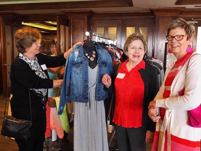 The volunteer spirit in action—these ladies could write a master class on matching the perfect outfit to its perfect person.