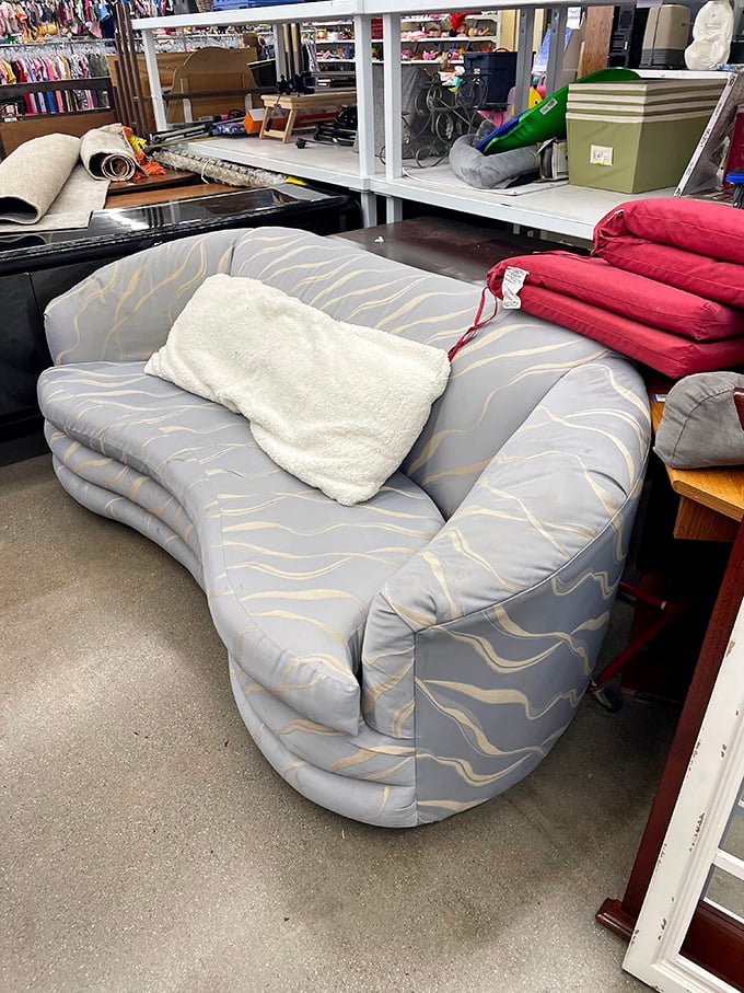 This curved blue sofa could be the statement piece your living room never knew it needed. Yesterday's luxury at today's bargain.