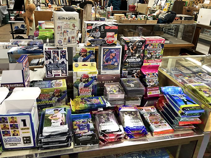 Baseball card heaven! For collectors, this table isn't just merchandise—it's childhood summers, heroes, and the sweet smell of bubblegum.