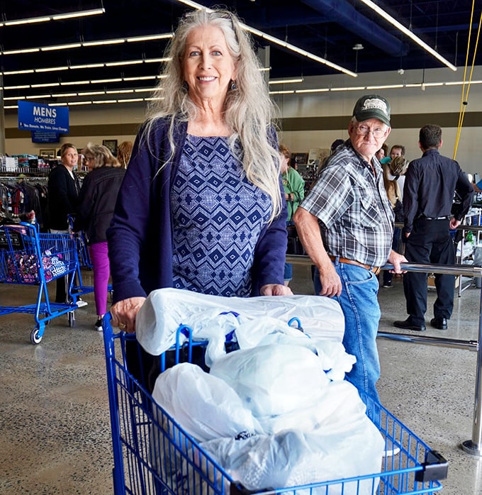 Shopping carts filled with possibility—the true currency at Goodwill isn't just dollars, but the thrill of discovery that keeps customers coming back.