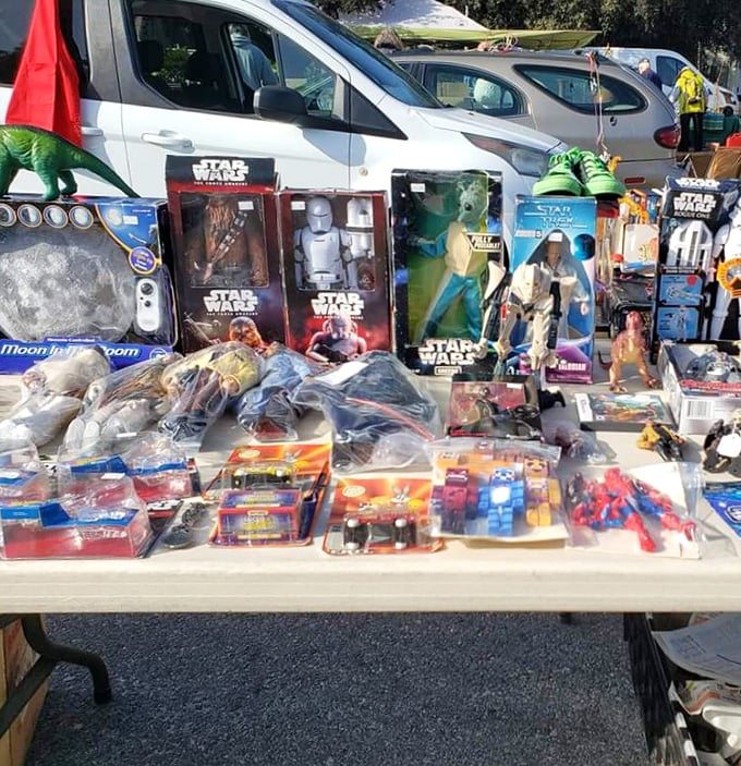 Star Wars figures stand at attention alongside vintage superheroes—a plastic army of nostalgia that turns grown adults into wide-eyed kids again.