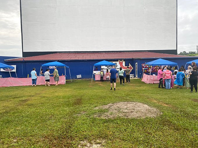 Families arrive early to claim their perfect spot in this outdoor cinema paradise.