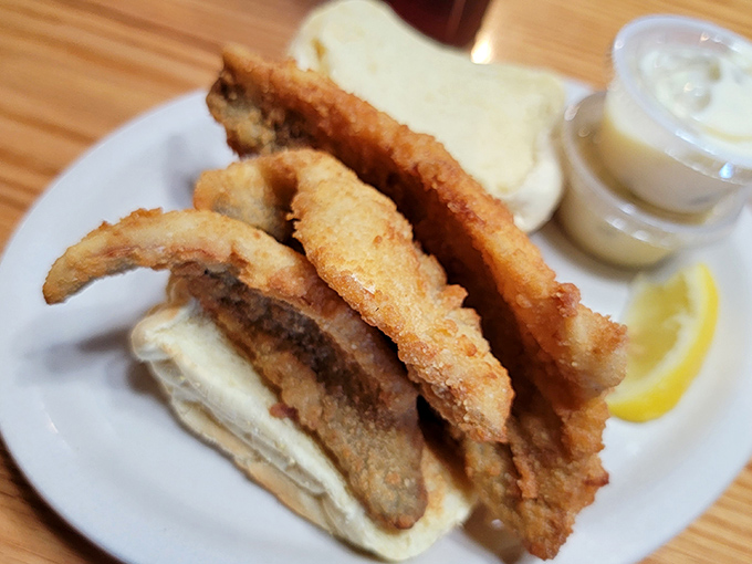 The walleye sandwich – where Lake Erie's prized catch meets pillowy bun in a relationship so perfect it deserves its own romance novel.