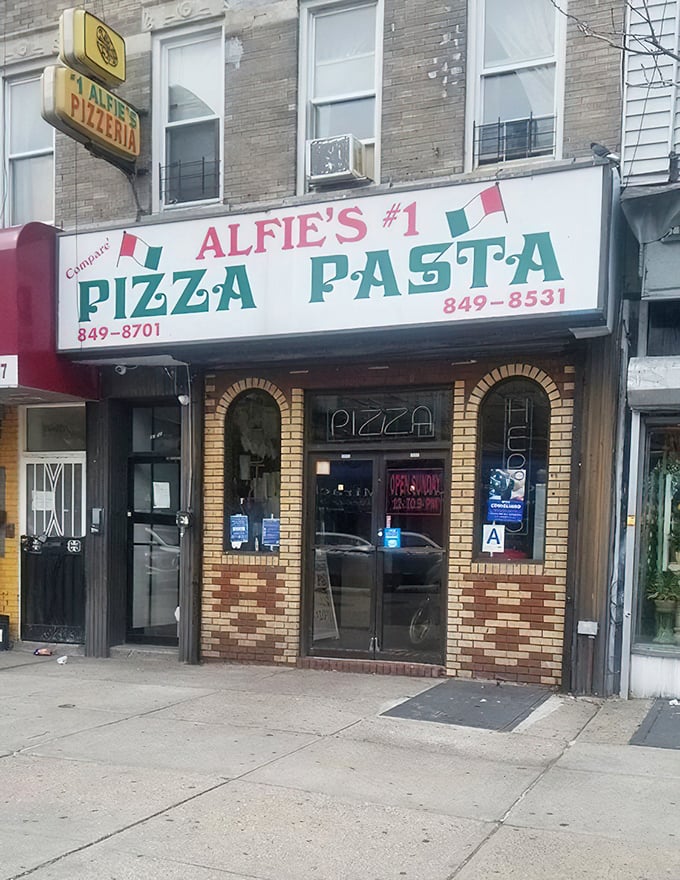 Alfie's humble storefront conceals pizza secrets that locals guard like family heirloom recipes do.