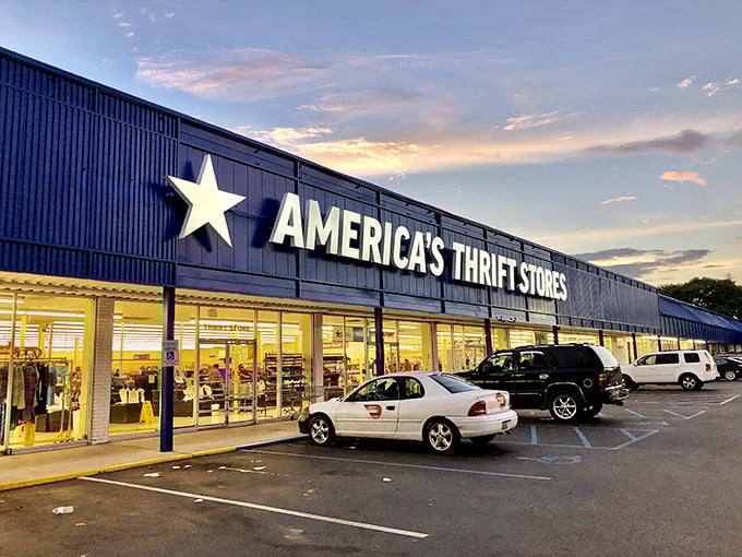 Alabaster's America's Thrift Store glows like a beacon for bargain hunters in the evening light.