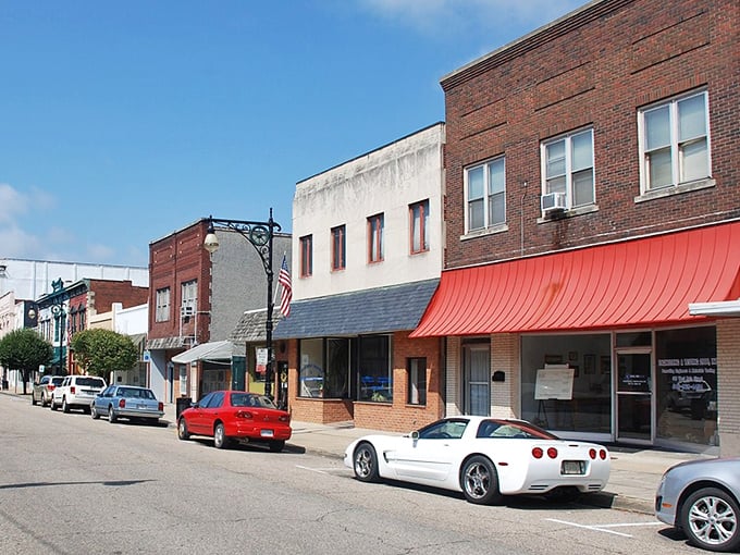 Classic small-town storefronts line up like patient neighbors waiting to share their stories.