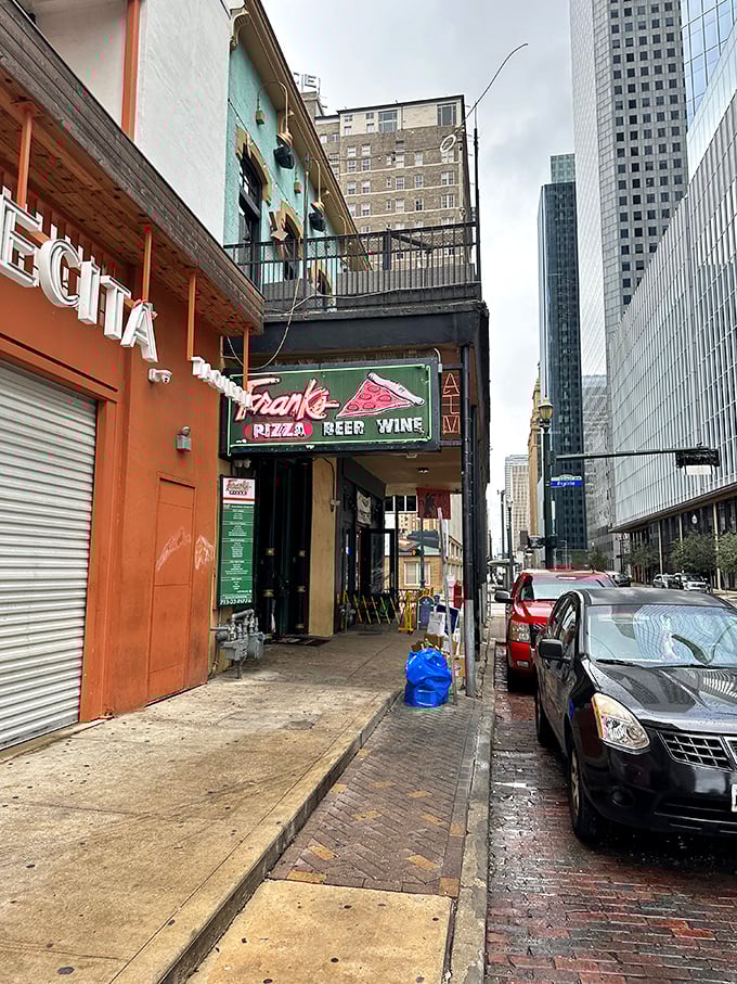 Frank's neon sign beckons night owls and pizza lovers alike. Downtown Houston's late-night slice sanctuary never disappoints.