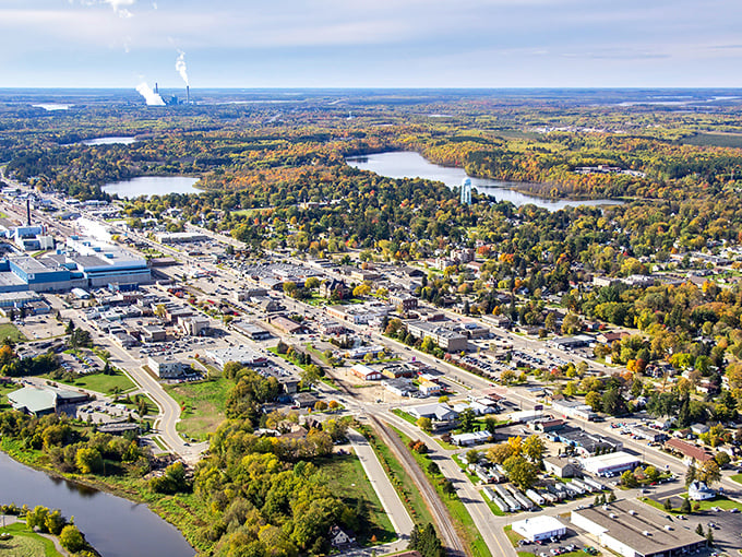 Bird's-eye views reveal a town perfectly nestled between lakes and forests, where natural beauty comes standard with residency.