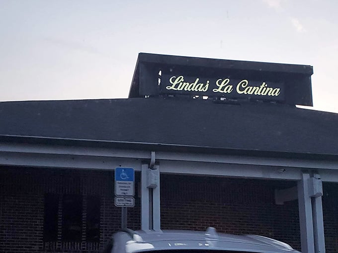 That glowing sign against the twilight sky – Linda's La Cantina has been Orlando's beacon for steak lovers since before Mickey arrived.