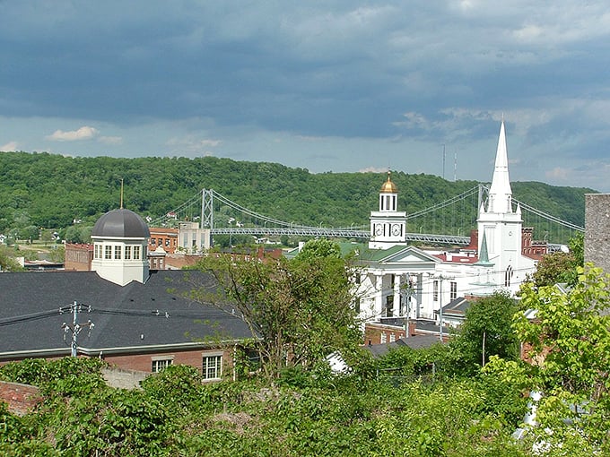 Maysville's skyline is punctuated with church steeples and historic buildings, with the Ohio River flowing faithfully alongside.