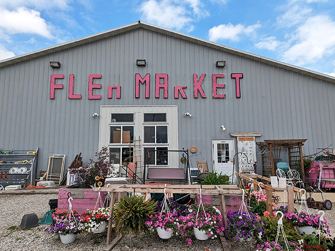 Me & My Sisters' simple gray building bursts with personality, pink lettering and hanging flower baskets offering a warm welcome.