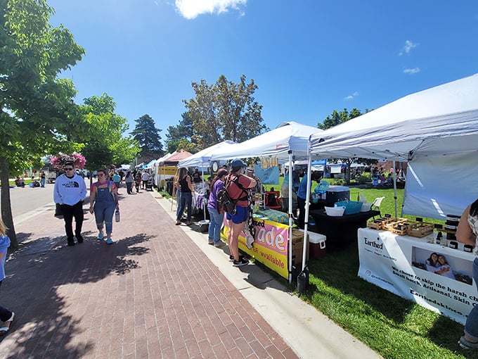 Park setting meets marketplace magic where families gather to shop, eat, and enjoy perfect weekend vibes.