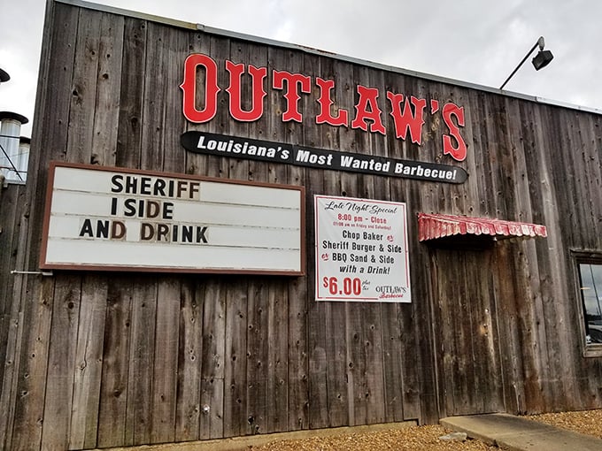 Outlaws BBQ's weathered wooden facade looks like it belongs in a Western movie – "Louisiana's Most Wanted Barbecue" is a bold claim they back up.